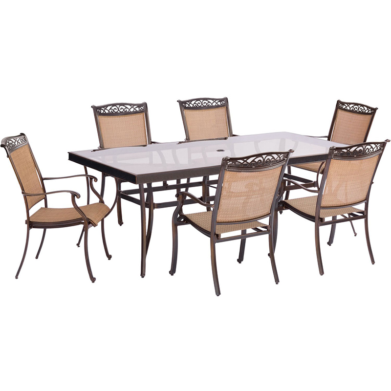 Hanover Fontana 7 Piece Outdoor Dining Set with 6 Sling Swivel Rockers and A 38 In. x 72 In. Cast Top Table